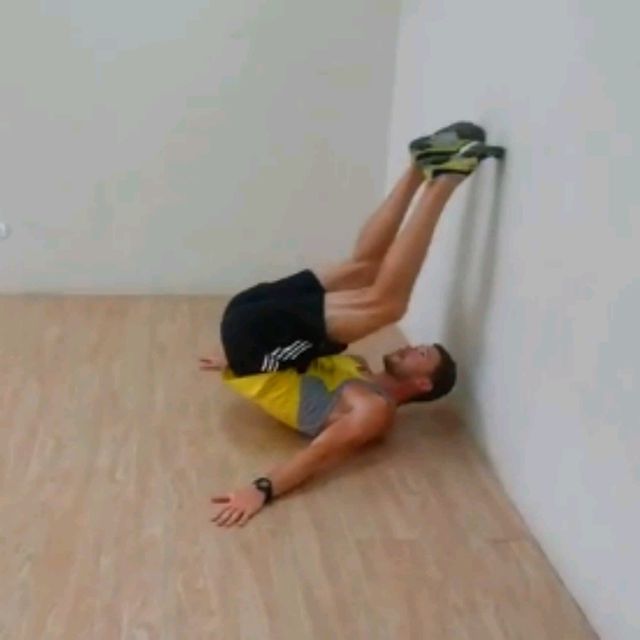 Leg Raises Touch Floor And Wall by Aysel S. - Exercise How-to - Skimble