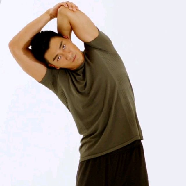 Standing lat stretch (left) by Tanya P - Exercise How-to - Skimble