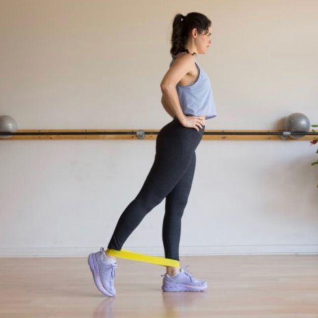 Banded Standing Right Leg Kickbacks by Brian Fallon - Exercise How-to ...