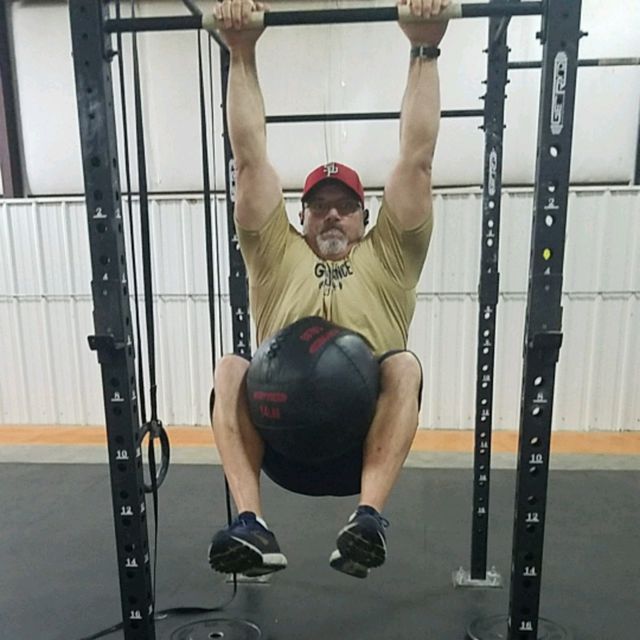 Weighted Knees To Chest by Michael Towles - Exercise How-to - Skimble