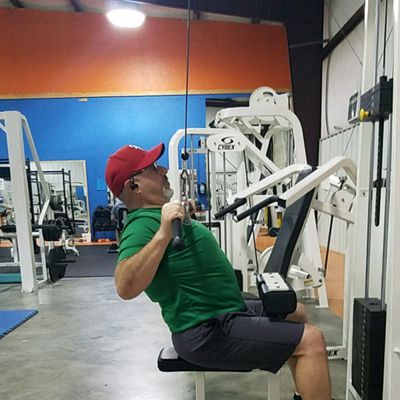 Weighted Knees To Chest by Michael Towles - Exercise How-to - Skimble