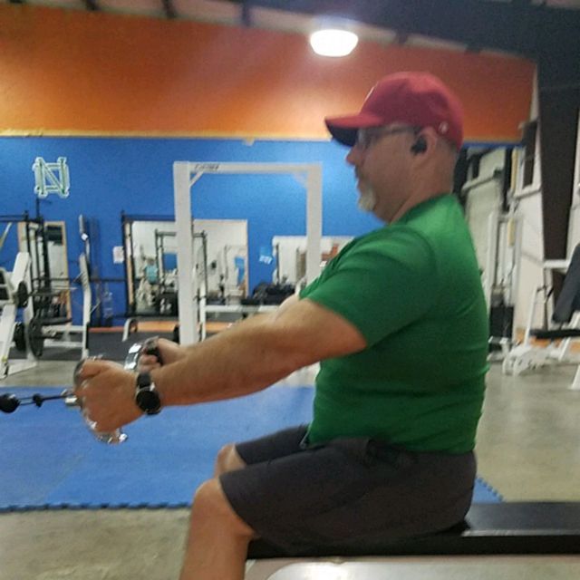 Seated Wide Grip Cable Deltoid pull by Michael Towles - Exercise How-to ...