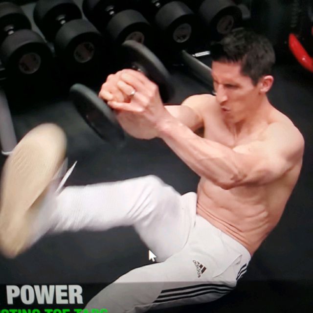 Dumbell Twisting Toe Tap by Marcos Rodriguez - Exercise How-to - Skimble