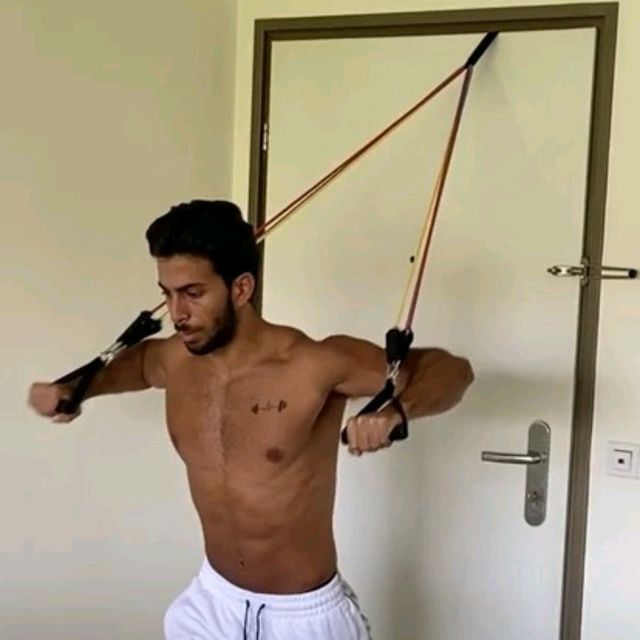 Chest press against high positioned resistance band by Tal H ...