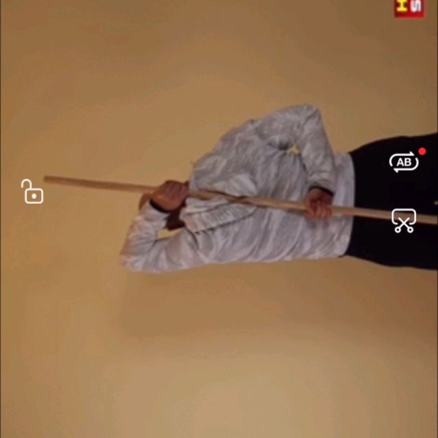 Stick Tricep And Shoulder Stretch by Chan Y. - Exercise How-to - Skimble