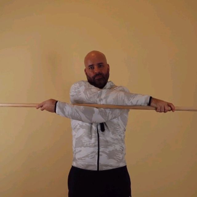 Left Twisting Stick Shoulders Stretch by Kirk W. - Exercise How-to ...