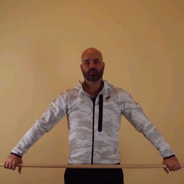 Bouncing Stick Shoulder Stretch by Kirk W. - Exercise How-to - Skimble