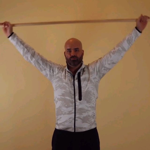 Bouncing Stick Shoulder Stretch by Kirk W. - Exercise How-to - Skimble