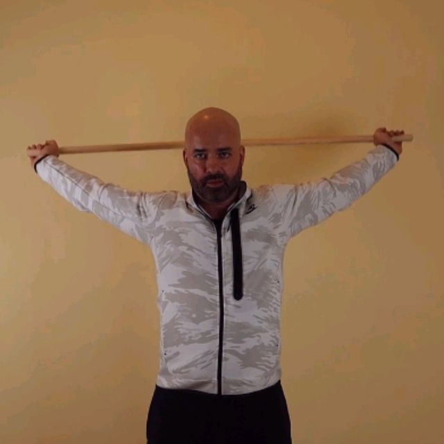 Bouncing Stick Shoulder Stretch by Kirk W. - Exercise How-to - Skimble
