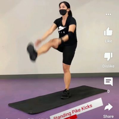 Standing Elbow to Knee Crunch by Carmina Viniegra - Exercise How-to ...