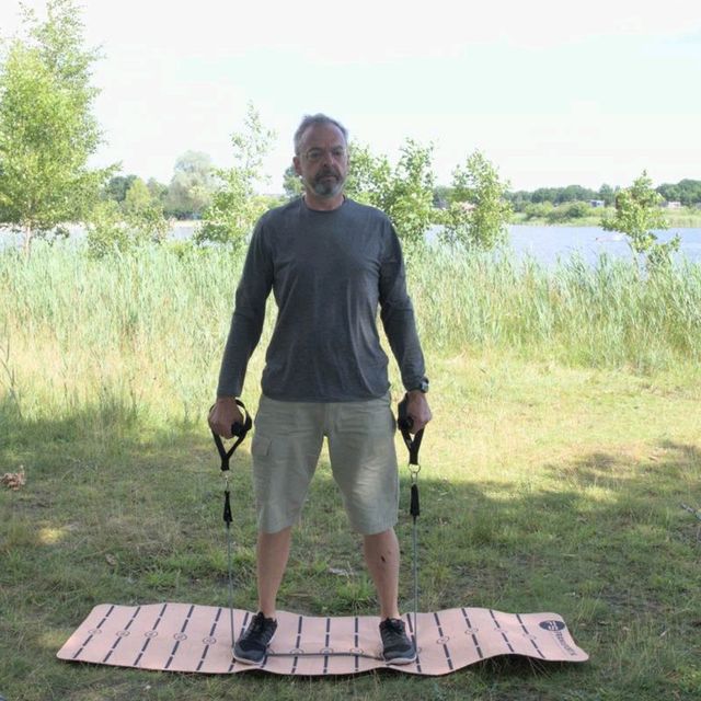 Bands Standing Chest Cross Over by Frank Roodenburg - Exercise How-to ...