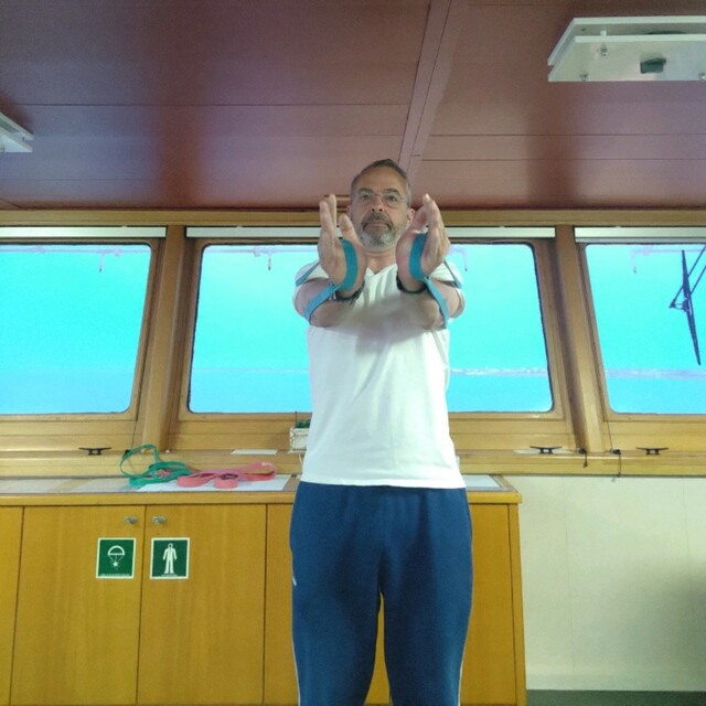 Banded Standing Chest Fly by Frank Roodenburg - Exercise How-to - Skimble