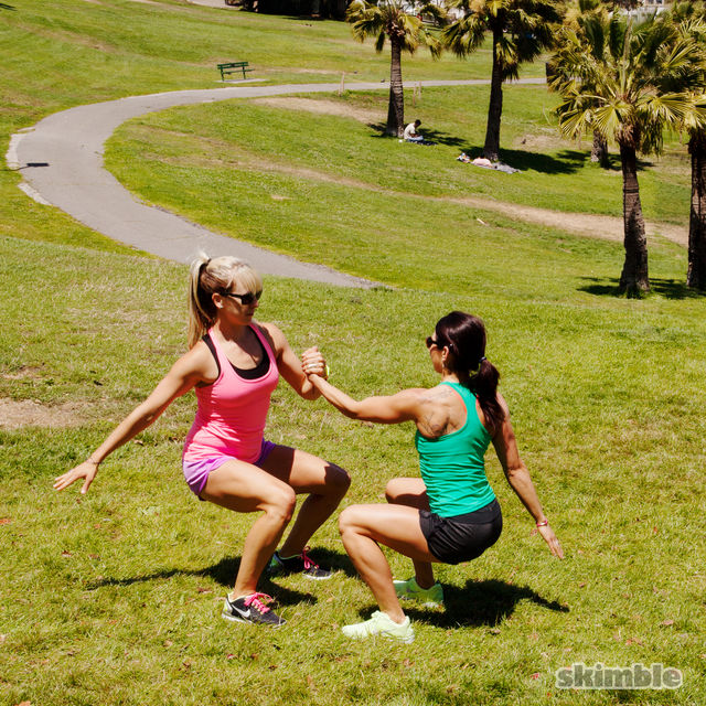 Seesaw Squats with Alternating Clasps - Exercise How-to - Skimble