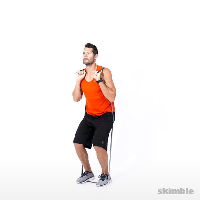 Squats with Band - Exercise How-to - Skimble Workout Trainer