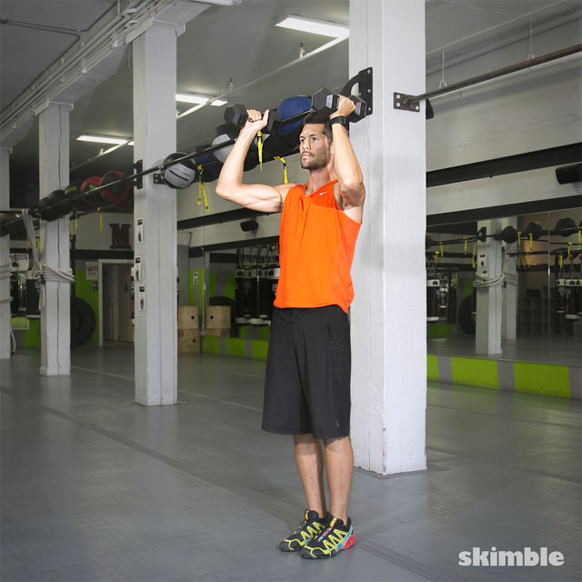 Estocada lateral con press de hombros - Ejercicio Cómo hacerlo - Skimble